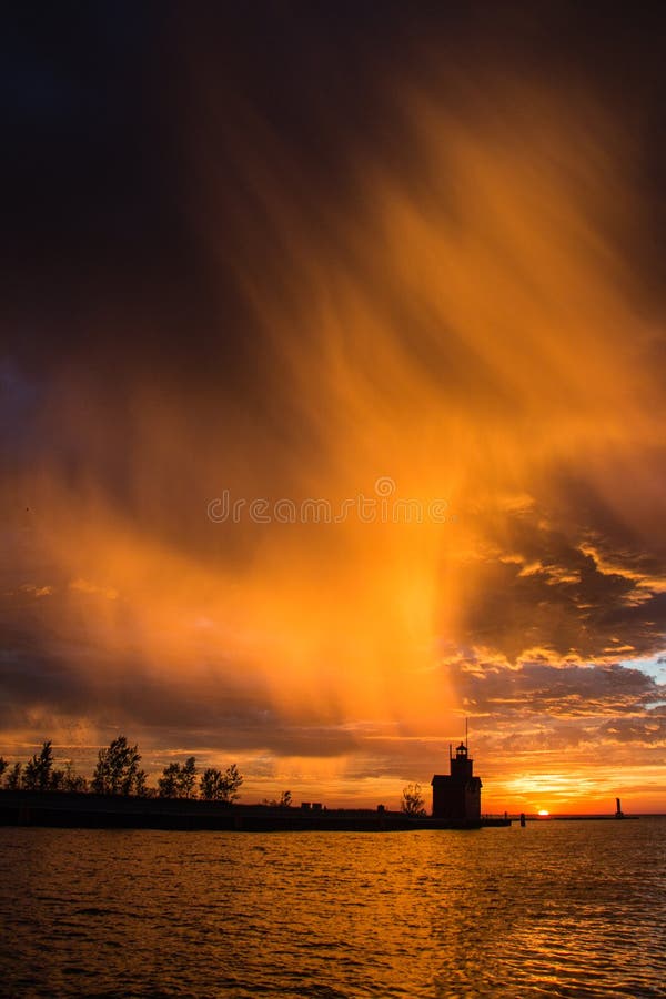Big Red lighthouse stock photo. Image of cloud, water - 113758738