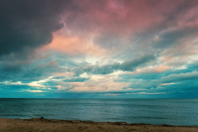 Dramatic sky over the sea stock photo. Image of background - 69929912