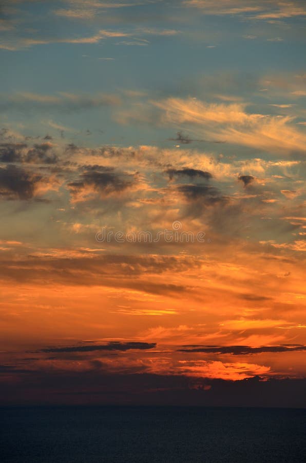Dramatic sky over the sea stock photo. Image of scene - 74956530