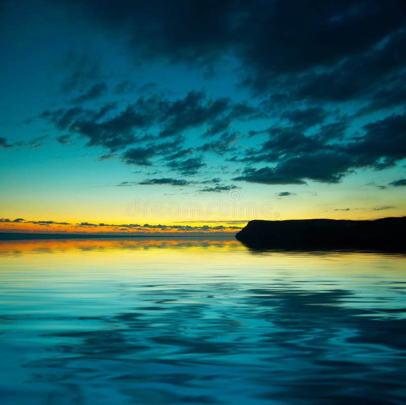 Dramatic sky over water stock image. Image of dark, sand - 5833487