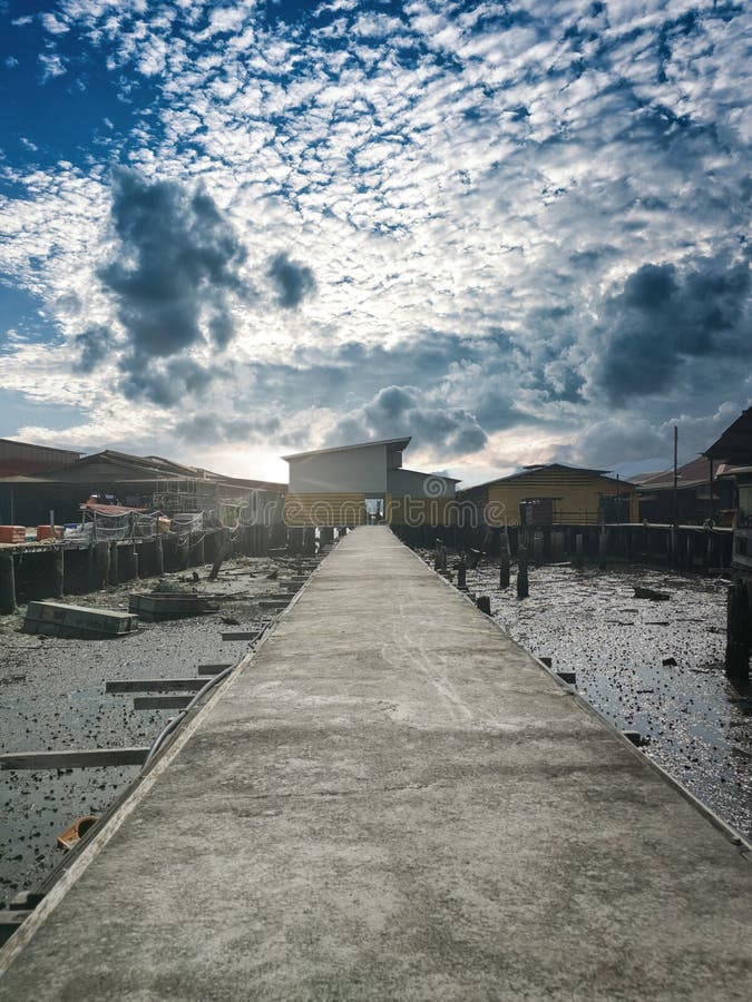 Dramatic Sky Scene when Across the Concrete Jetty Stock Photo - Image ...