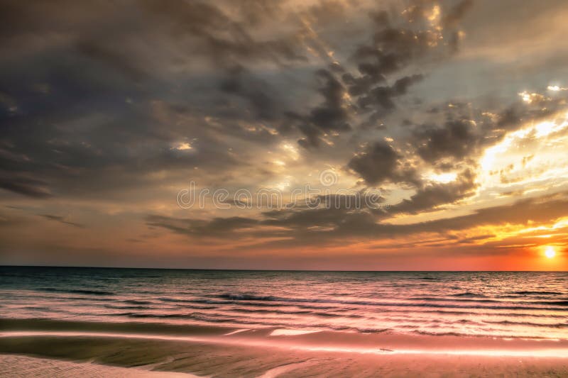 Dramatic Sky at Sea Sunset, before a Storm, in Motion Stock Photo ...
