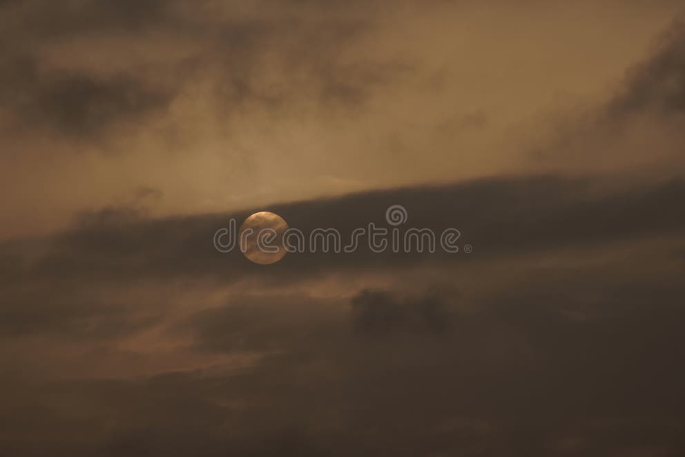 Dramatic Sky: Sun Veiled by Clouds Stock Photo - Image of spiritual ...
