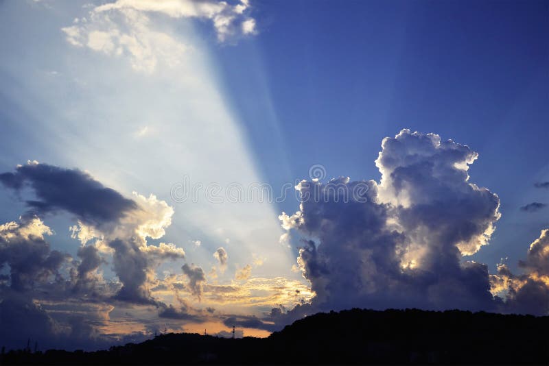 Dramatic Sky with Sunbeams and Dynamic Clouds at Sunset Stock Image ...