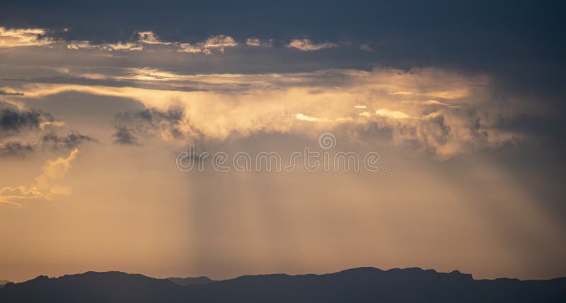Sunbeams between the Clouds at Sunset. Stock Image - Image of sunrise ...