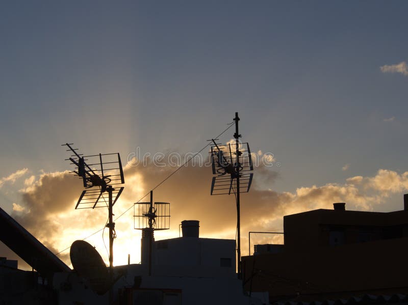 Dramatic Sky in the Sunset with Roofs Stock Image - Image of backlight ...