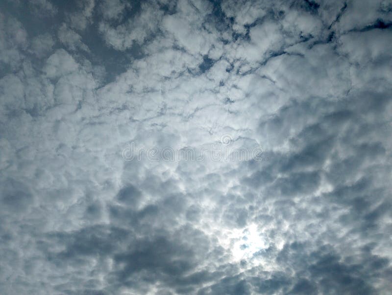 Dramatic Sky: Textured Clouds & Obscured Sun Stock Image - Image of ...