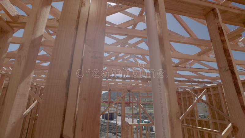 A Slow Motion Panning Movement of New Home Wood Framing Construction ...