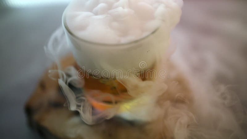 Smoke Puffs from a Dry Ice Drink Prepared by a Bartender Stock Footage ...