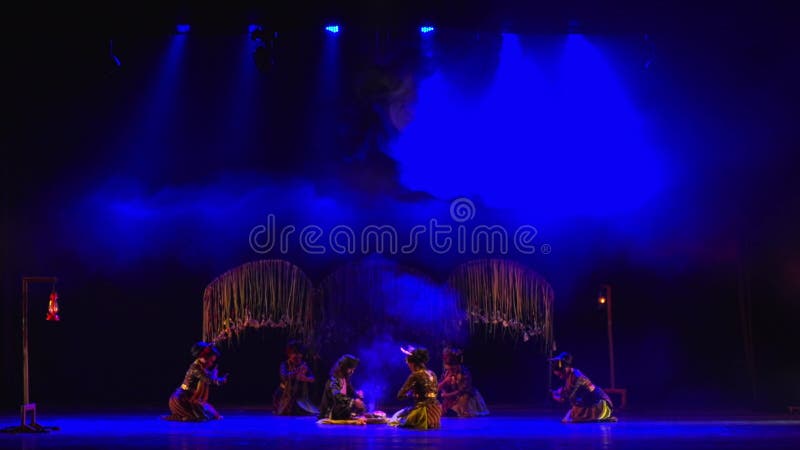 Dramatic Stage Performance with Actors in Silhouette and Blue Stage ...