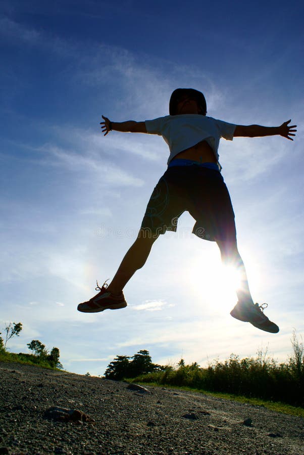 Dramatic Star Jump Silhouette Stock Photo - Image of leisure ...