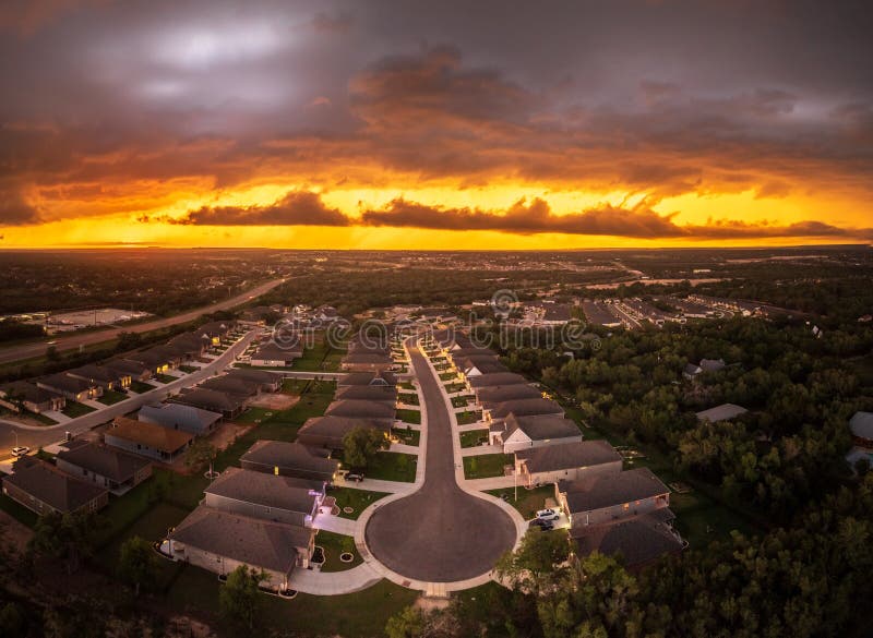 Dramatic Storm Clouds Lit by Setting Sun Over Texas Retirement ...