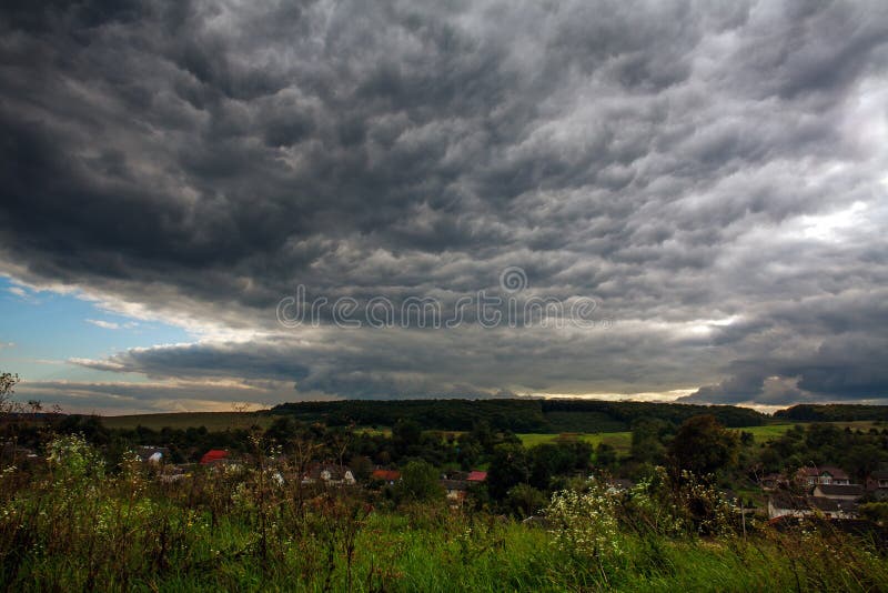 Dramatic Storm Sky Above Village and Forest Stormy Weather Stock Image ...