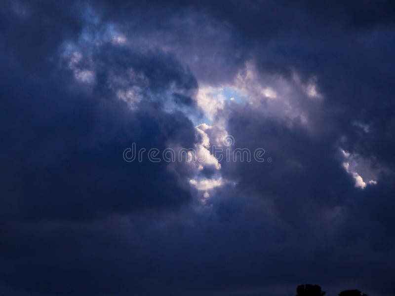 Dramatic stormy cloudy sky stock photo. Image of dark - 104752094