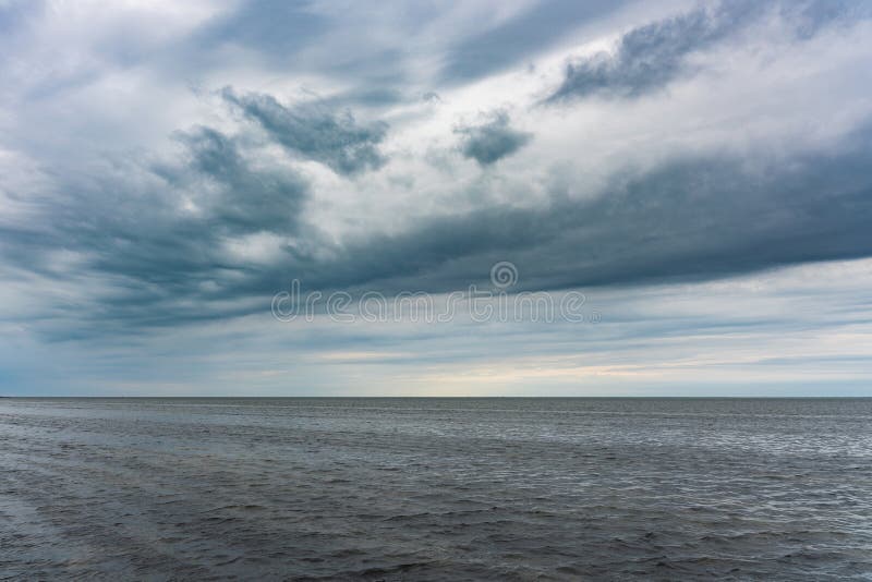 Dramatic Stormy Sky Over the Sea. Bad Weather at the Resort Stock Image ...