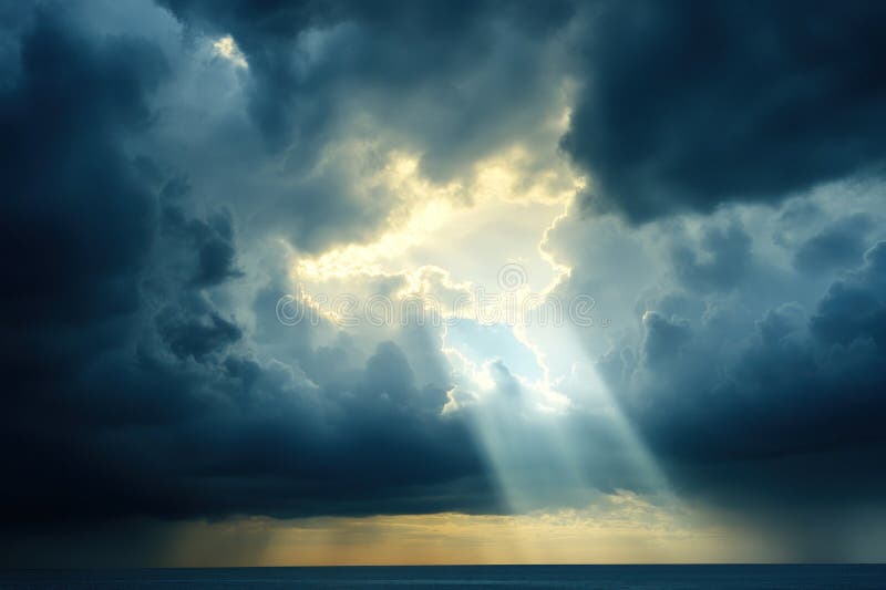 Dramatic Stormy Sky with Sun Rays Breaking through Dark Clouds Over the ...