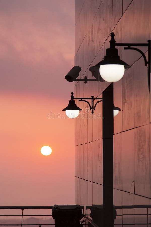 Dramatic Street Lights of the City at Sunset Stock Photo - Image of ...