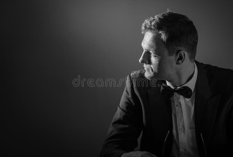 Dramatic Studio Portrait of a Man. Black & White Photo Stock Photo ...