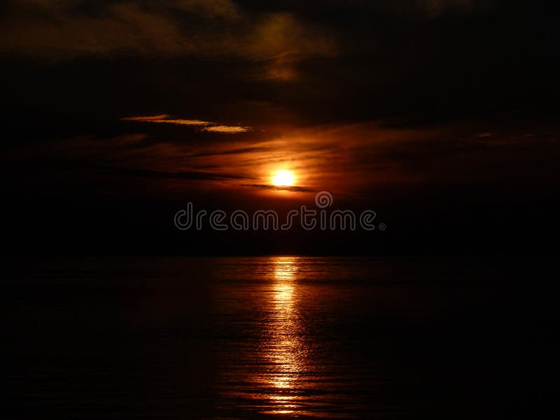 Dramatic Summer Sunset at the Evening with Sun Reflection on the Water ...