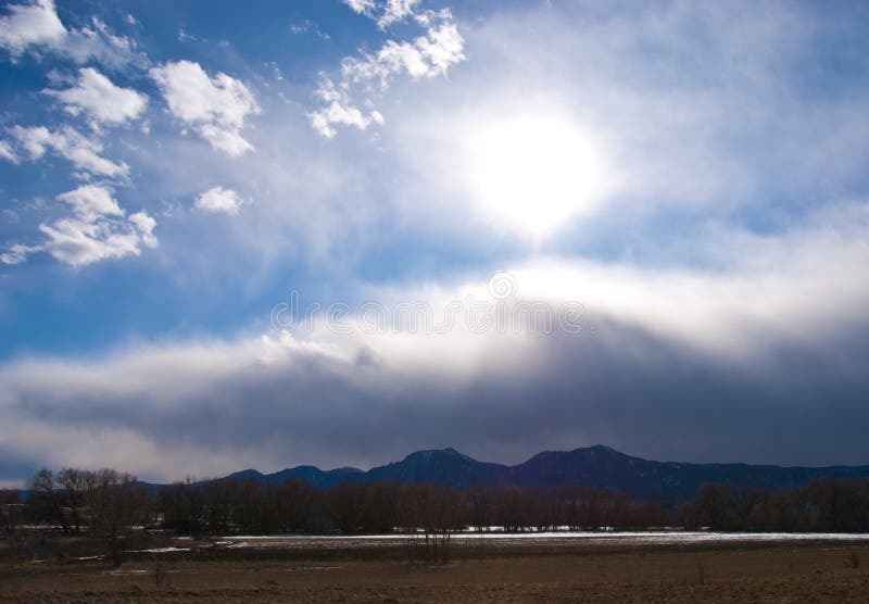 Dramatic Sun and Mountain Skylne Stock Photo - Image of dream, dark ...