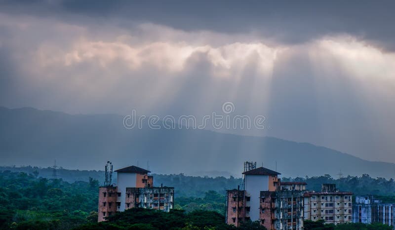 Dramatic Sun Rays Falling on the Buildings Stock Image - Image of ...