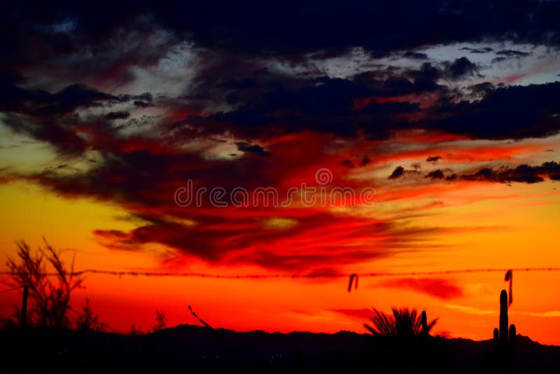 Dramatic Sun Setting Skies in Apache Junction and Mesa Area Stock Image ...