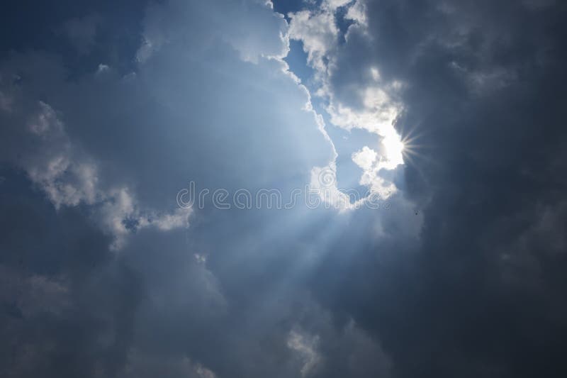 Dramatic Sunlight during Thick Clouds Stock Image - Image of scene ...