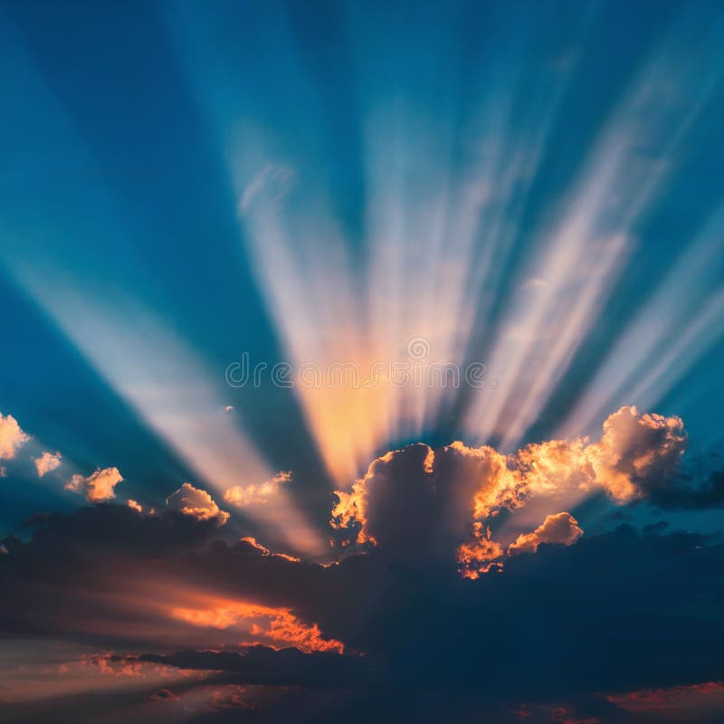 Dramatic Sunrise with Blue Sky and Orange Sun Rays Breaking through ...