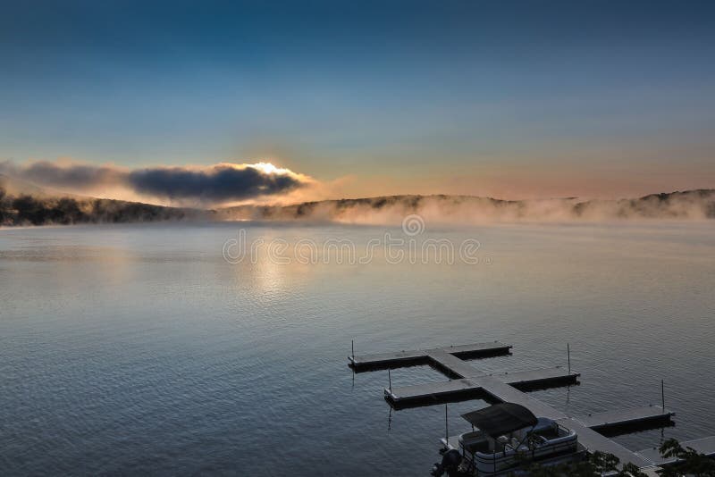 Dramatic Sunrise Over Deep Creek Lake with an Empty Dock. Maryland, USA ...