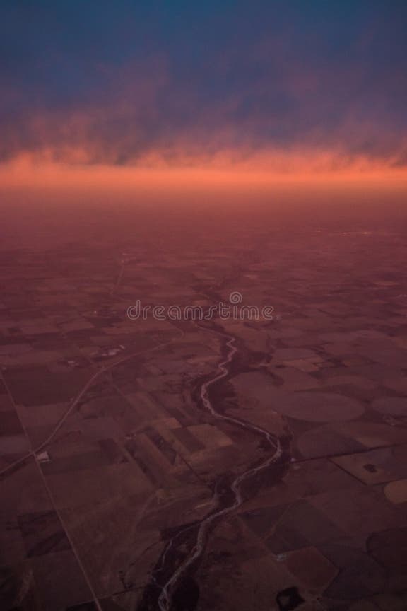 Dramatic Sunrise Over Open Fields and River Stock Image - Image of ...