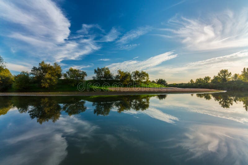 Dramatic Sunrise on Tranquil Lake with Reflections Trees Stock Photo ...