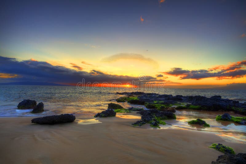 Dramatic Sunset on the Beach Stock Photo - Image of rocks, beach: 12208700