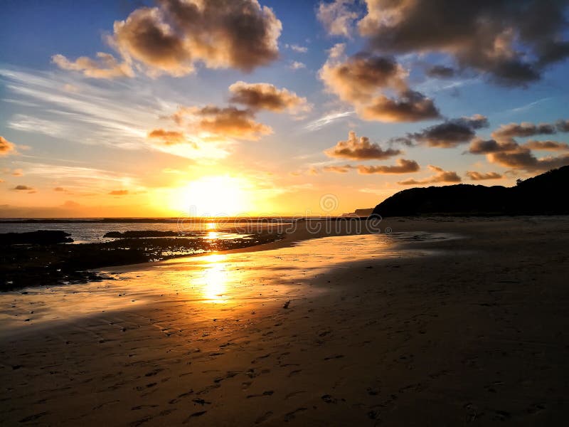 Dramatic Sunset on the Beach Stock Image - Image of vibrant, dramatic ...