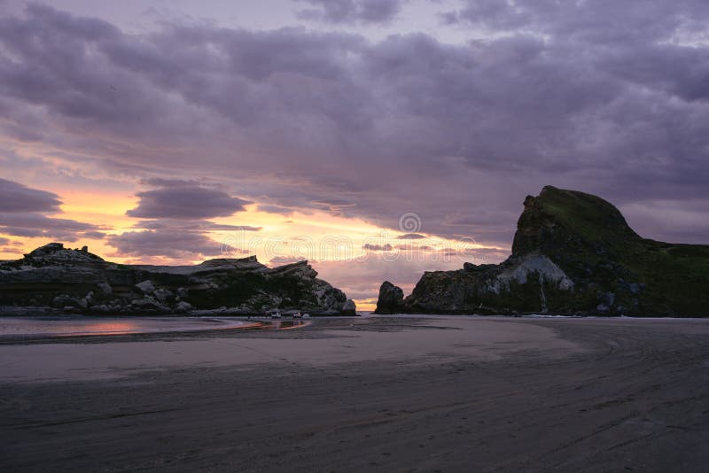 Dramatic Sunset at the Beach with Big Rock Formations. Stock Photo ...