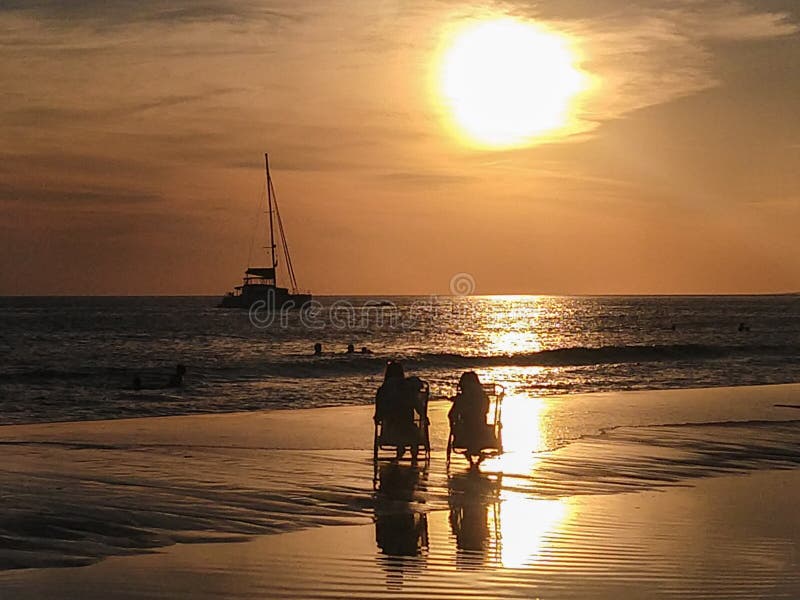 Couple shadow on the beach stock image. Image of shadow - 138877167