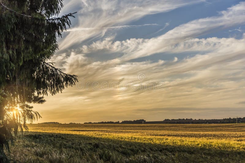 Dramatic sunset and clouds stock photo. Image of farm - 97903778
