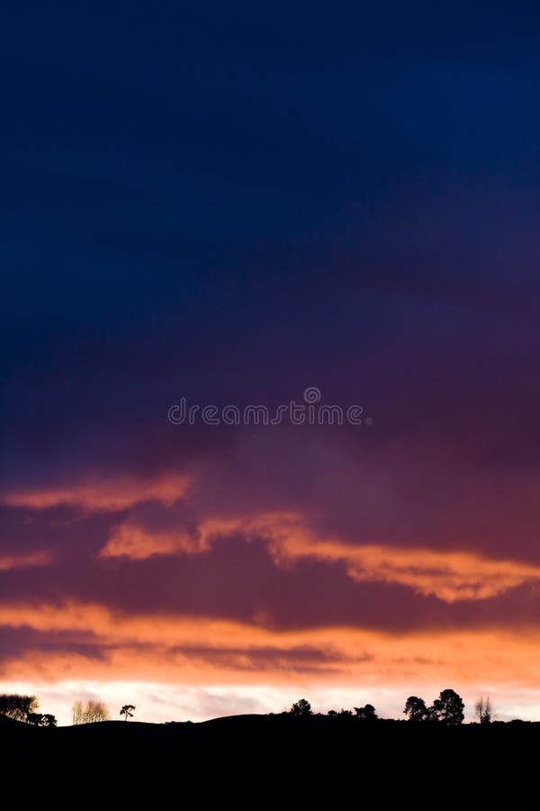 Dramatic Sunset On Curved Landscape Stock Image - Image of scenic ...