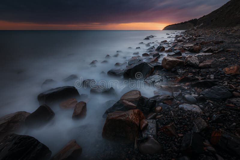 Dramatic Sunset Landscape with the Rocky Coast Stock Image - Image of ...