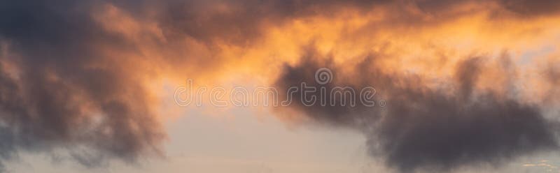 Dramatic Sunset with Light Blue Sky and Colorful Bright Clouds, As a ...