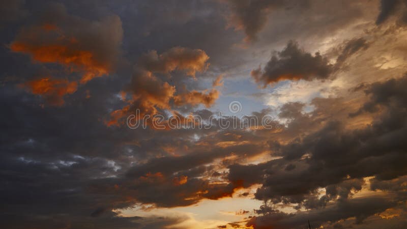 Dramatic Sunset Like Fire in the Sky with Golden Clouds. Stock Photo ...