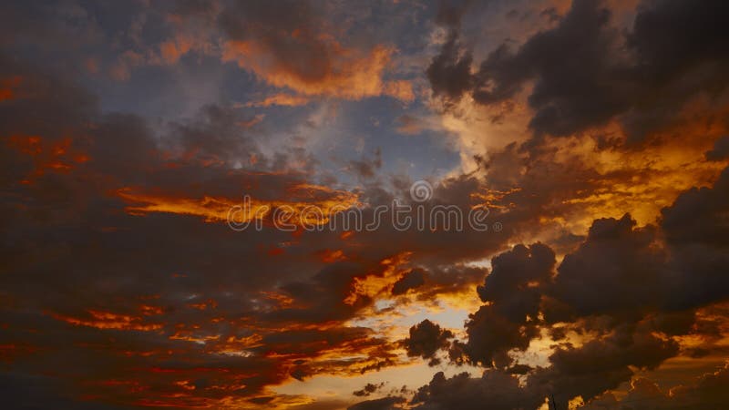 Dramatic Sunset Like Fire in the Sky with Golden Clouds. Stock Photo ...