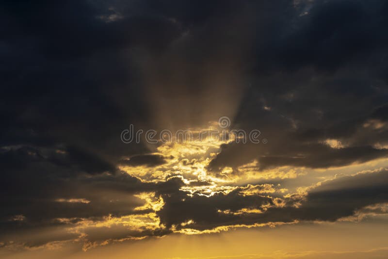 Golden Sun Rays Break through the Clouds - Beautiful Nature Background ...
