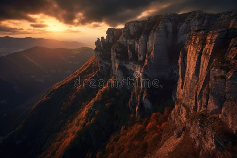 Dramatic Sunset with Mountain Shadows on Cliffside Stock Illustration ...