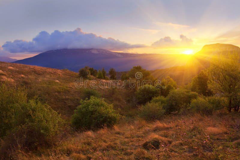 Dramatic Sunset in a Mountains Stock Image - Image of bright, clouds ...