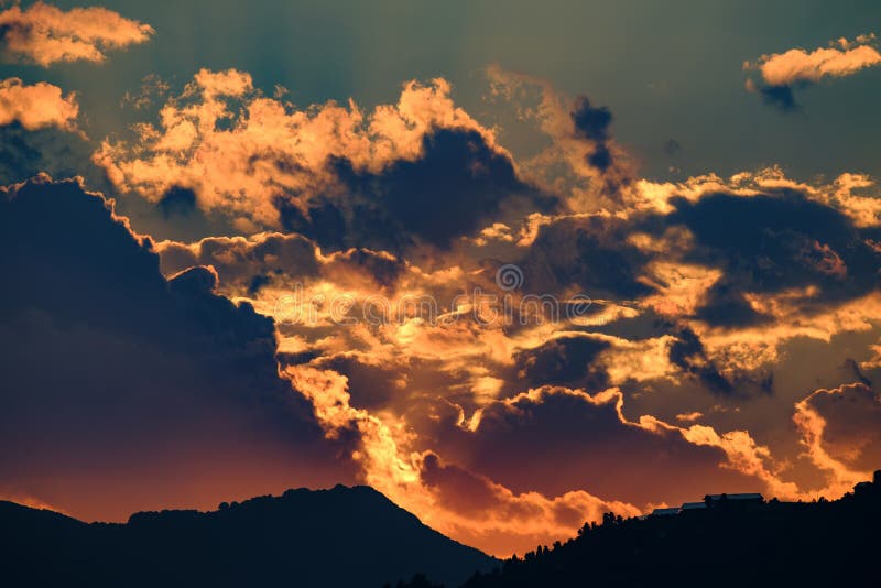 Dramatic Sunset in the Mountains Stock Image - Image of hills, cloudy ...