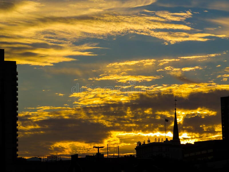Dramatic Sunset Over a Cityscape Stock Image - Image of sunset, sunrise ...