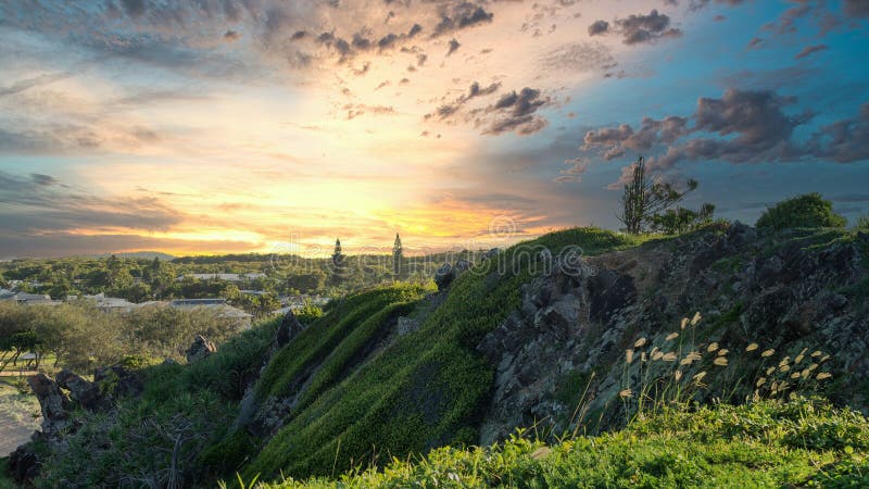 Dramatic Sunset Over a Cliff Stock Photo - Image of dramatic, bright ...