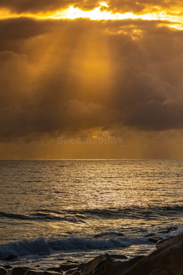 Dramatic Sunset Over the Coast of the Sea Stock Photo - Image of water ...