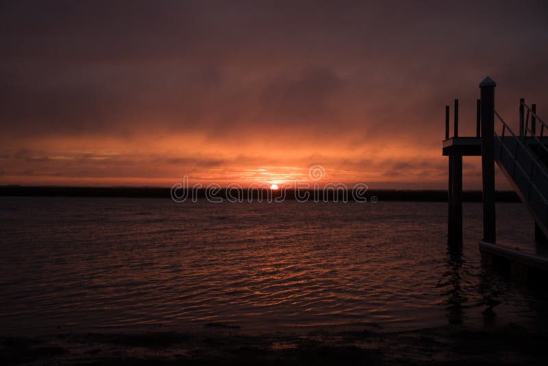 Dramatic Sunset Over the Marsh Stock Photo - Image of lookup, cloudporn ...