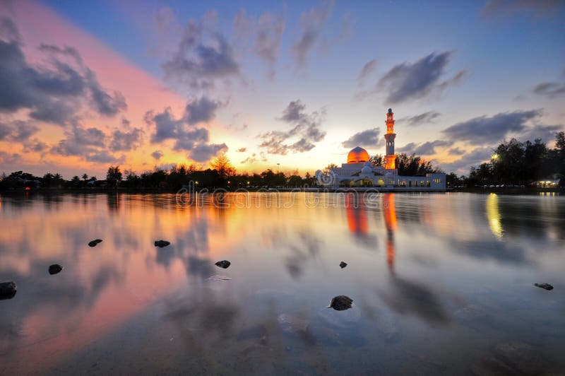 Dramatic Sunset Over the Mosque with Sky Reflections on Water Stock ...